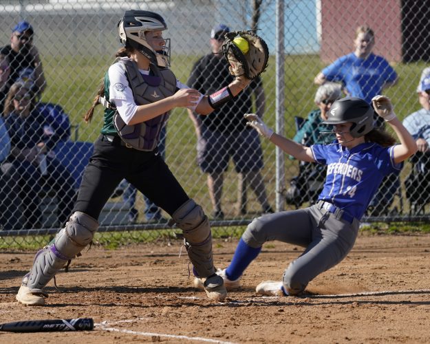 Seven players combine for 10 hits as Warrior Run softball tops ...